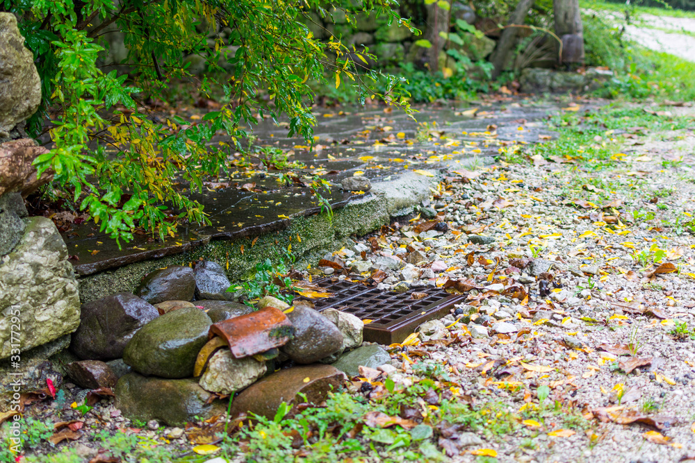 Old gully grid on a historic italian farm. The gully is sunk in the ...