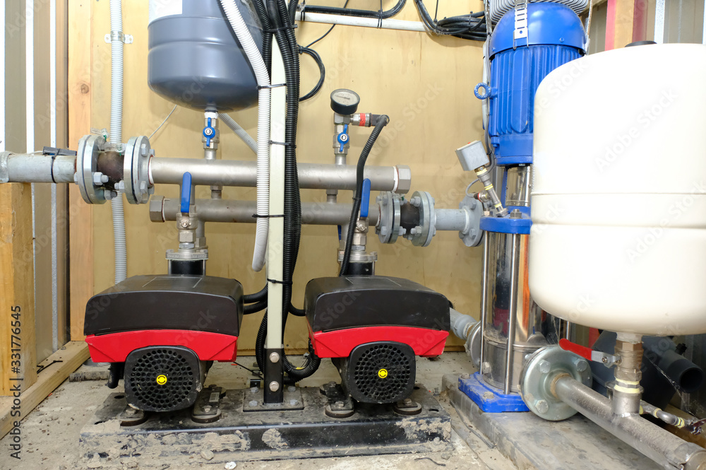 Water Centrifugal pump and motor line with pipe rack in power plant ...
