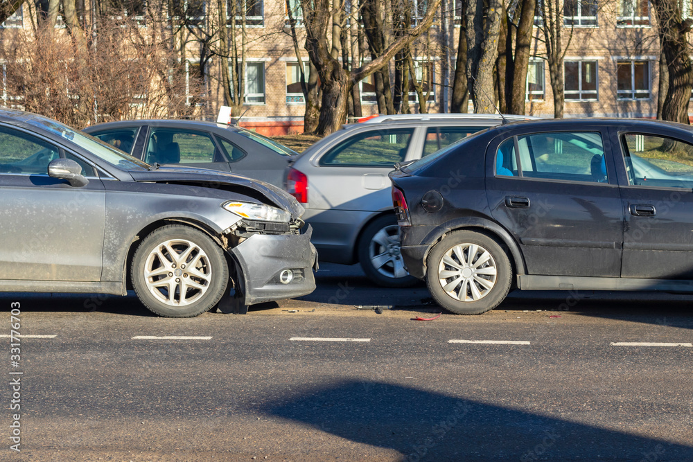 street lighting. City street, several cars were crashed into an ...