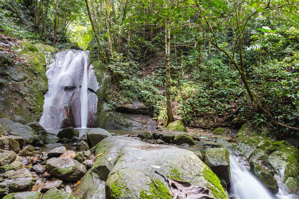 Waterfall at the rainforest of Sarawak, Borneo, Malaysia. Water falls ...
