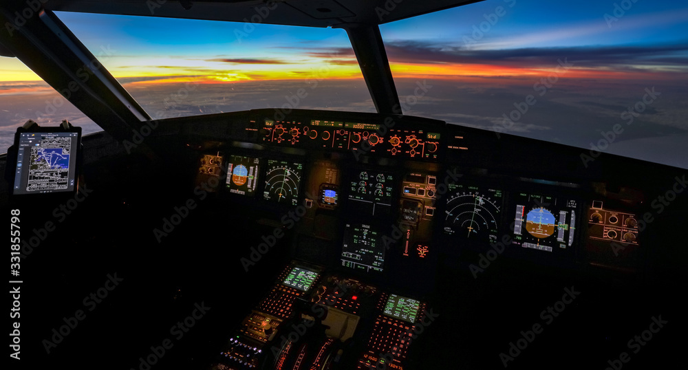 Sunset in the flightdeck of the Airbus A320 Stock Photo | Adobe Stock