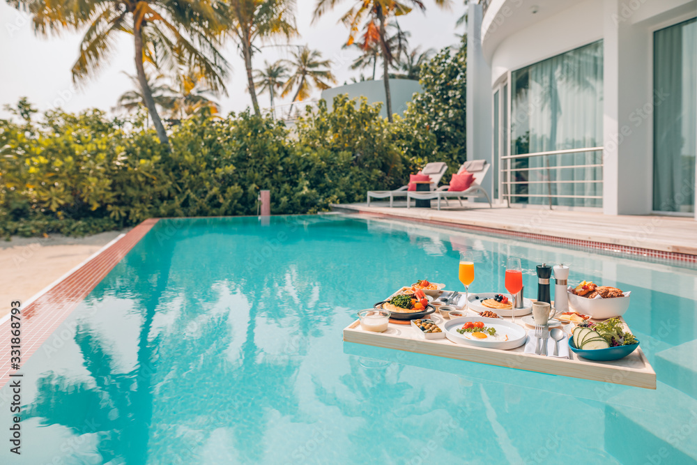 Breakfast in swimming pool, floating breakfast in luxurious tropical ...