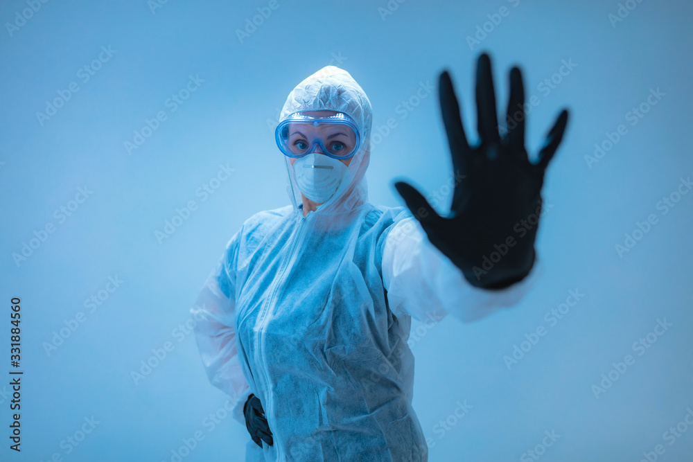 Medical doctor, scientist in full body suit for prevention from viruses ...