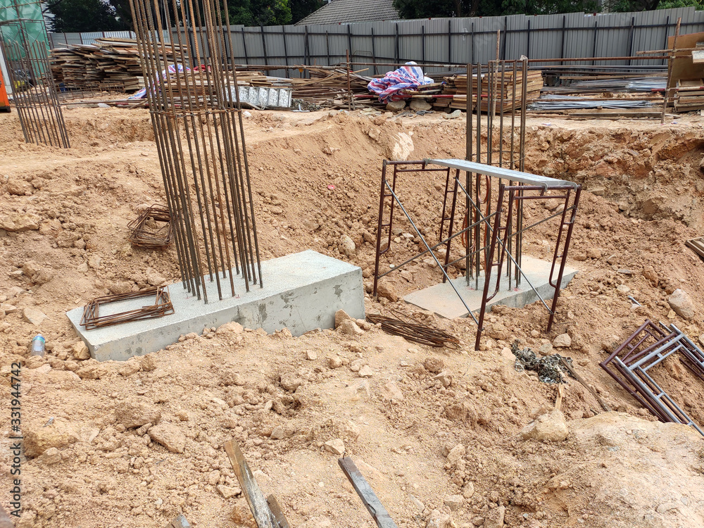 Pile cap and column stump under construction at the construction site ...