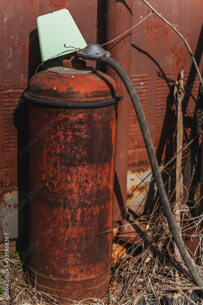 Old rusty propane tank. Metal cylinder for natural gas. Cylinder for ...