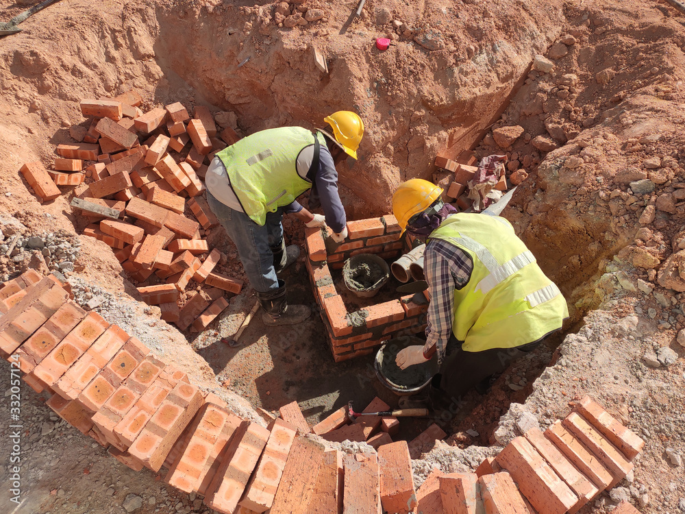 SEREMBAN, MALAYSIA -MARCH 10, 2020: Utility services manhole under ...