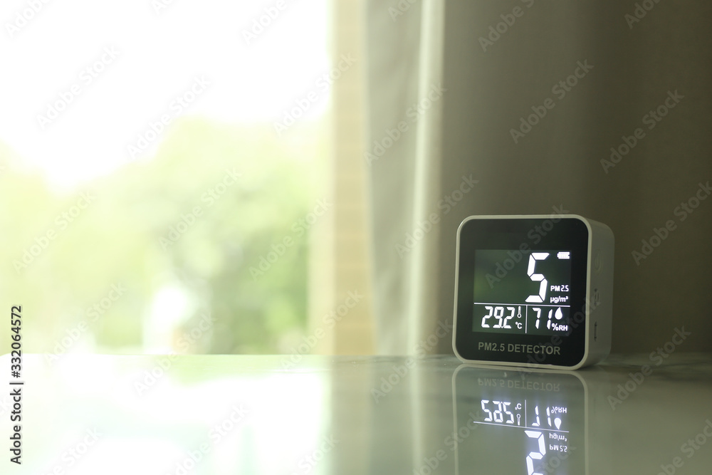 air quality sensor placing on a table indoor. sensor found small amount ...