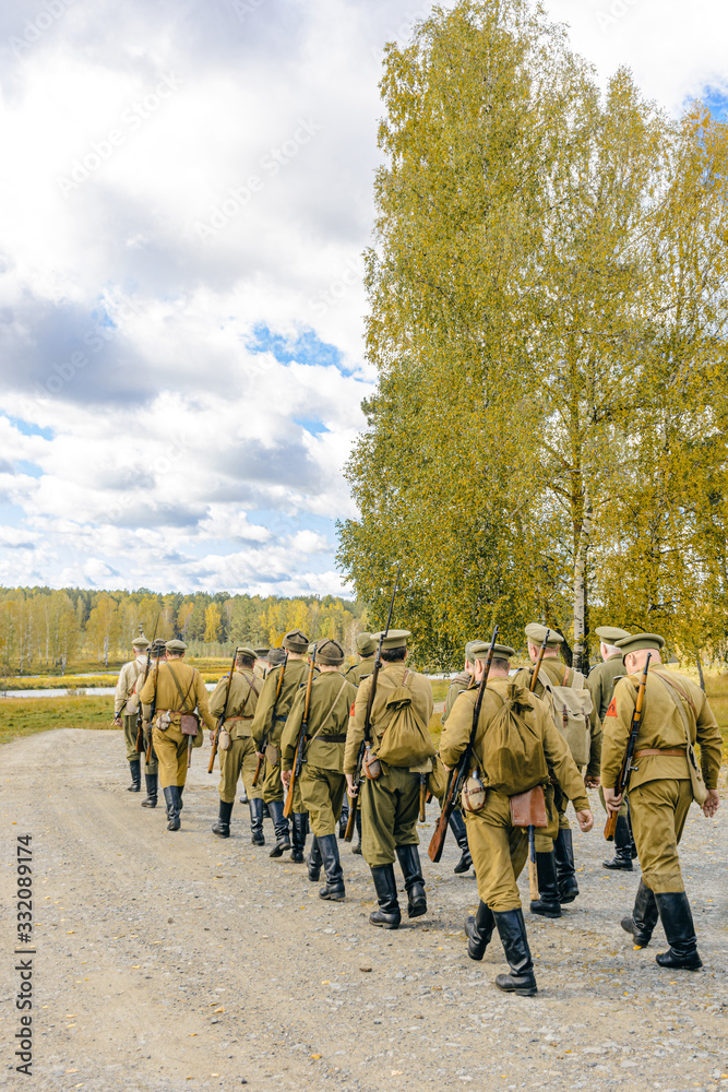 Formation of Russian soldiers during the war. Historical reenactment ...