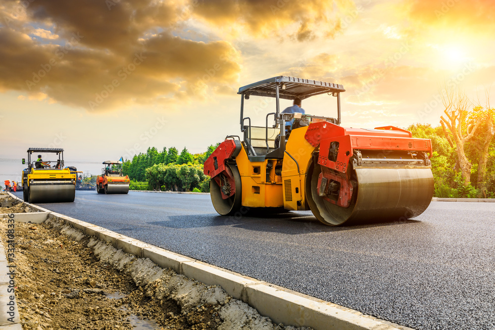 Construction site is laying new asphalt road pavement,road construction ...