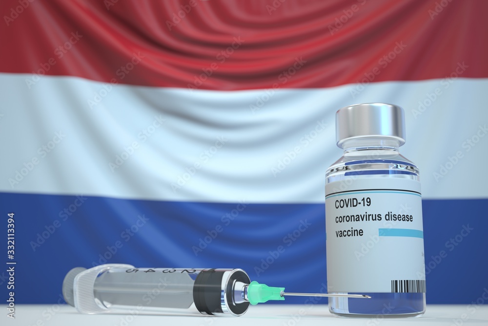 COVID-19 coronavirus disease vaccine vial and syringe against the Dutch ...