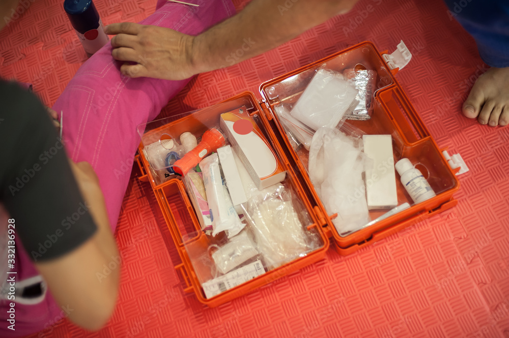 Handy first aid pack with essentials to repair basic injuries Stock ...