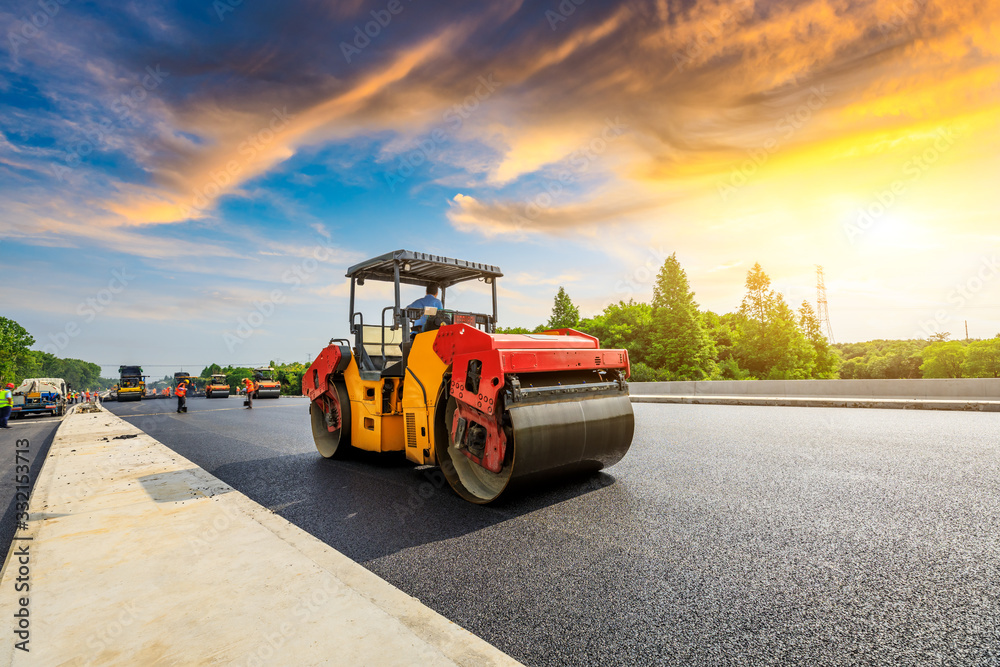 Construction site is laying new asphalt road pavement,road construction ...