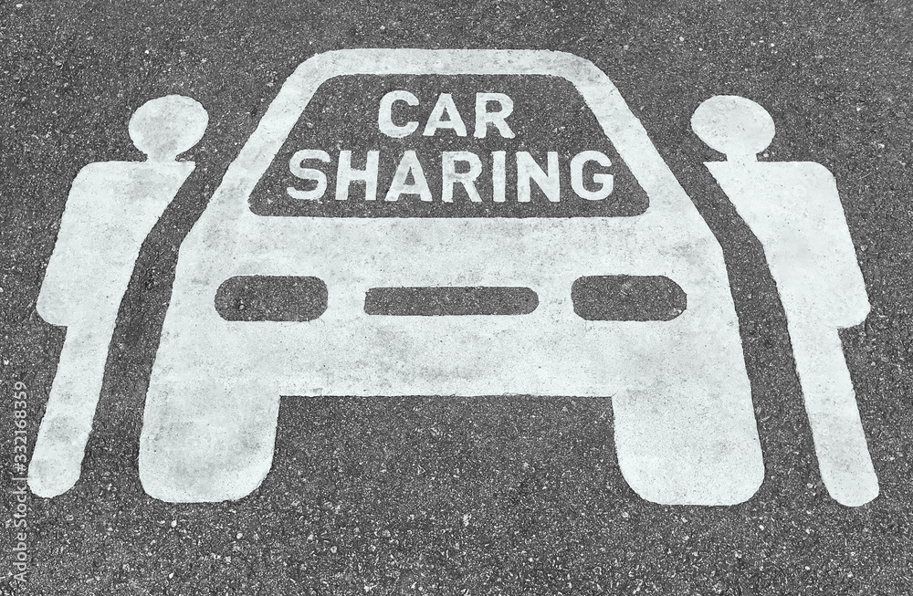 Car sharing parking symbols painted onto asphalt road. Car sharing ...
