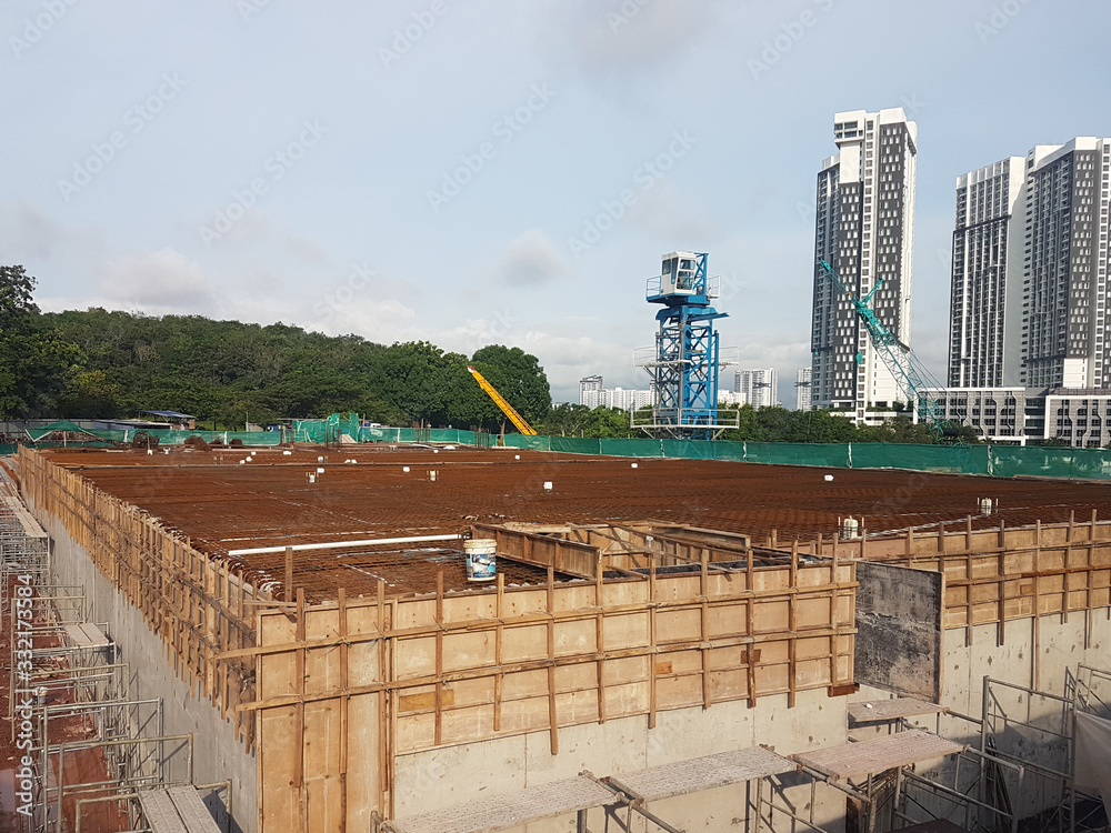 Building floor slab under construction. Construction workers ...