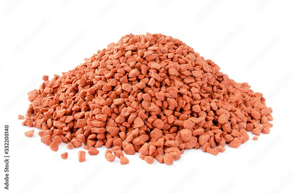 Heap of red mineral fertilizers on a white background. Potassium ...