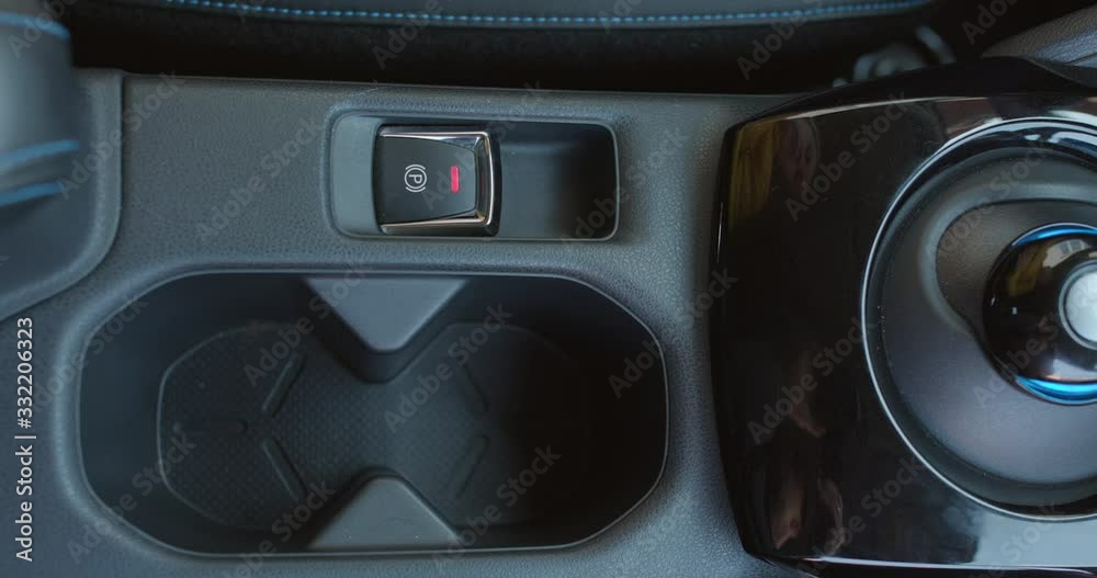 Finger pushing the button of car parking system. Close up shoot of ...