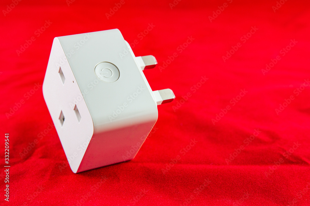 WiFi Smart Power Socket of White color on a red background Stock Photo ...
