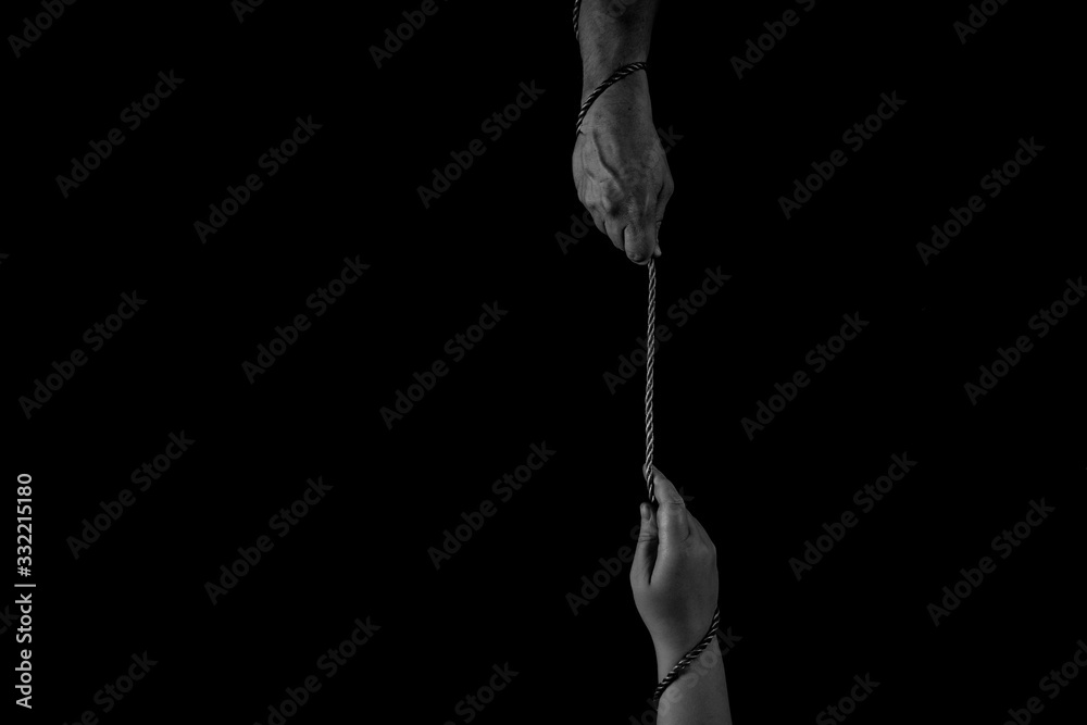 Helping Hand, Hand reaching, trying to pull up with rope and rescue ...