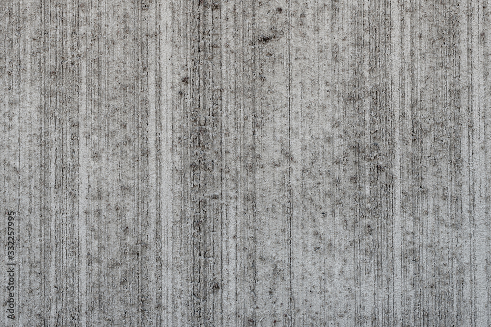 Concrete wall with rough structure, grey and weathered in high detail ...
