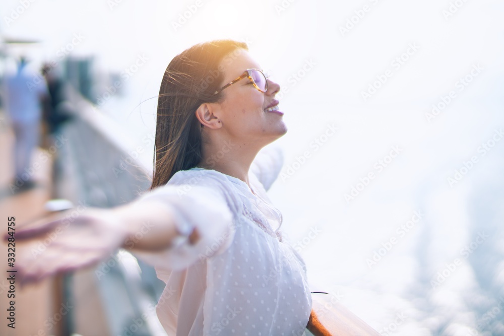 Young beautiful woman on vacation smiling happy and confident. Standing ...