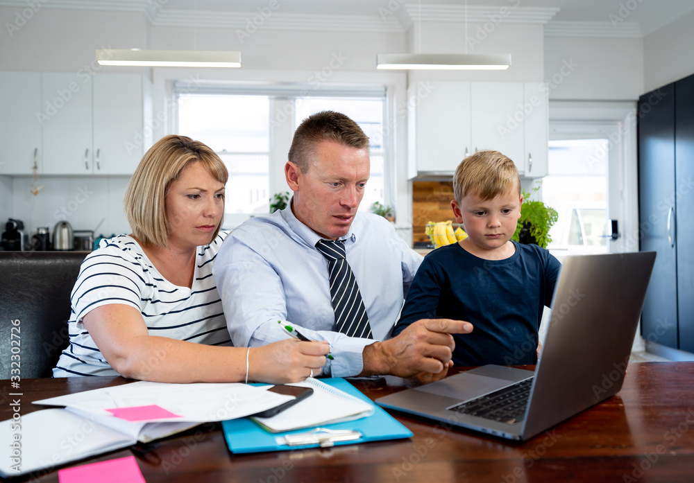 Children fighting and parents in distress over home finances. Covid-19 ...