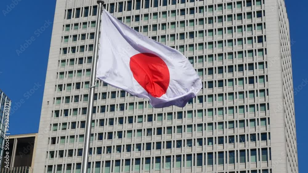 Japan flag with background of modern high-rise building in Tokyo,Japan ...