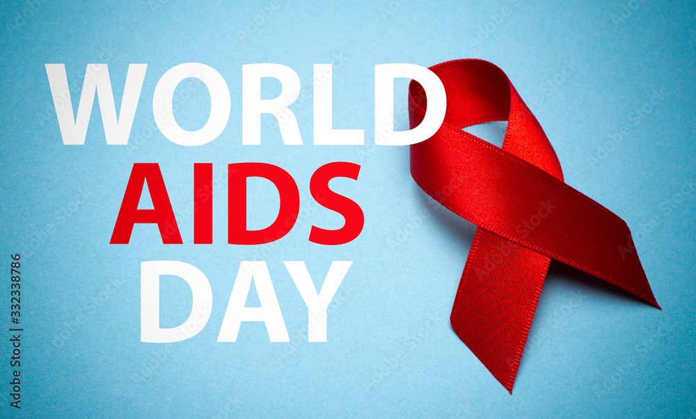 AIDS ribbon on a blue background with text. Red ribbon, symbol of World ...