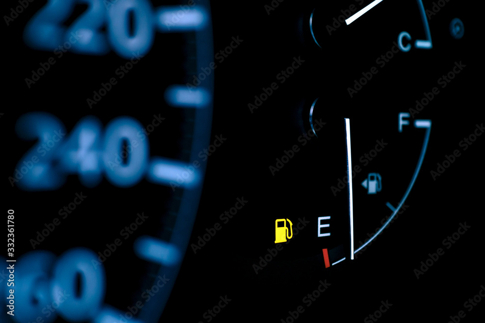 car dashboard shows low fuel warning light, selective focus Stock Photo ...