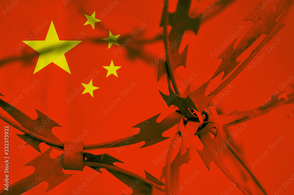 Abstract image of the national flag of China with twisted barbed wire ...