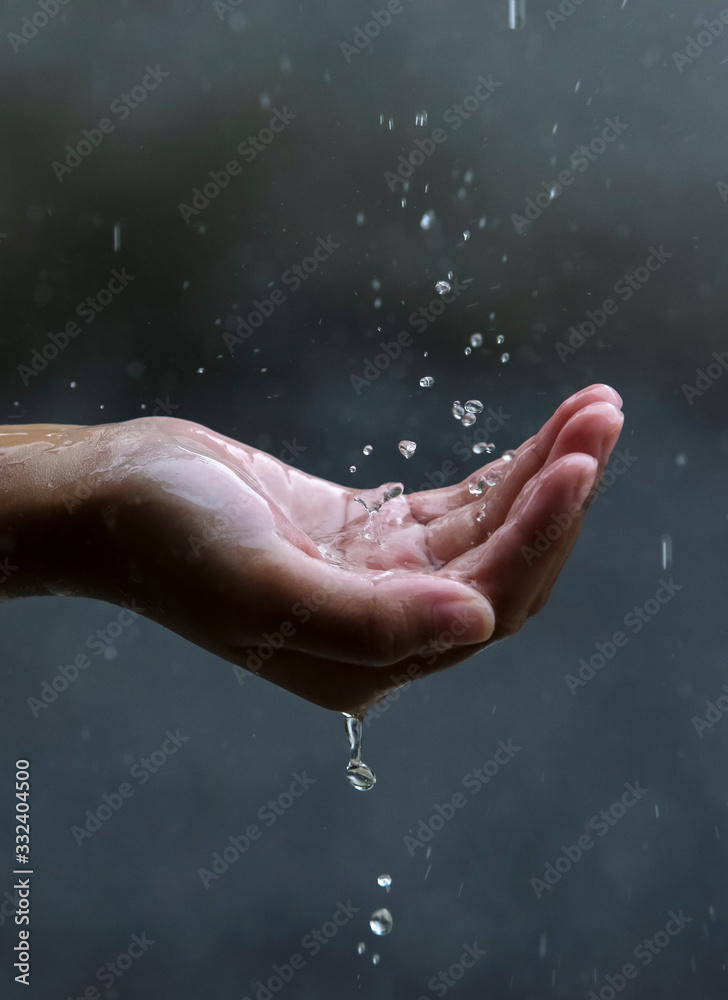 Palm hands with water splash Stock Photo | Adobe Stock
