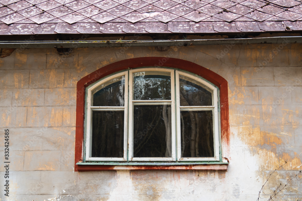 Detail of an old factory windows in the sunlight. Industrial photo ...