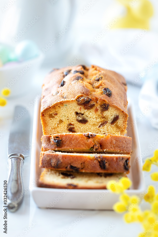 Delicious traditional fruitcake with raisins and candied fruit. Sliced ...