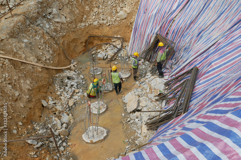 Bore pile cut to level by the construction workers. Next stage is ...