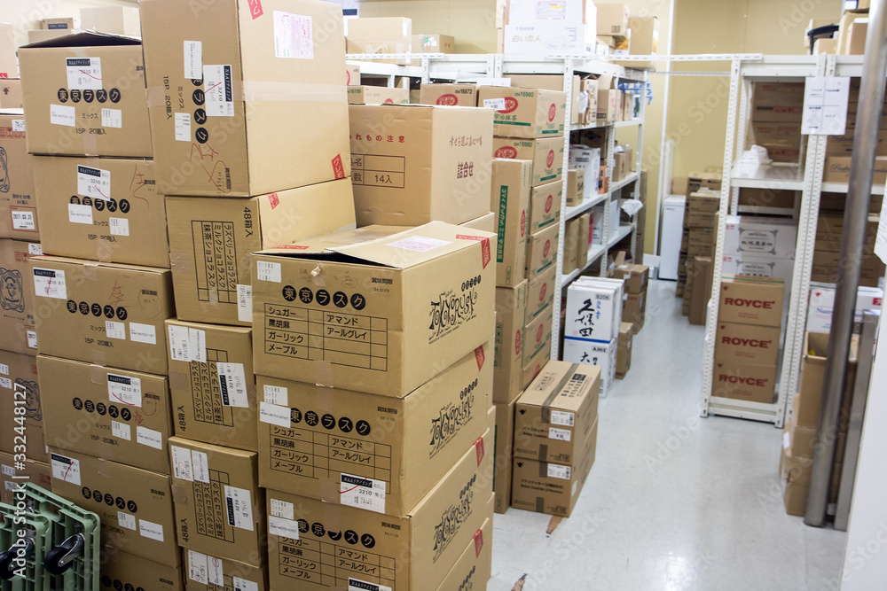JAPAN, TOKYO, Cardboard boxes in a warehouse store. Storage of goods on ...