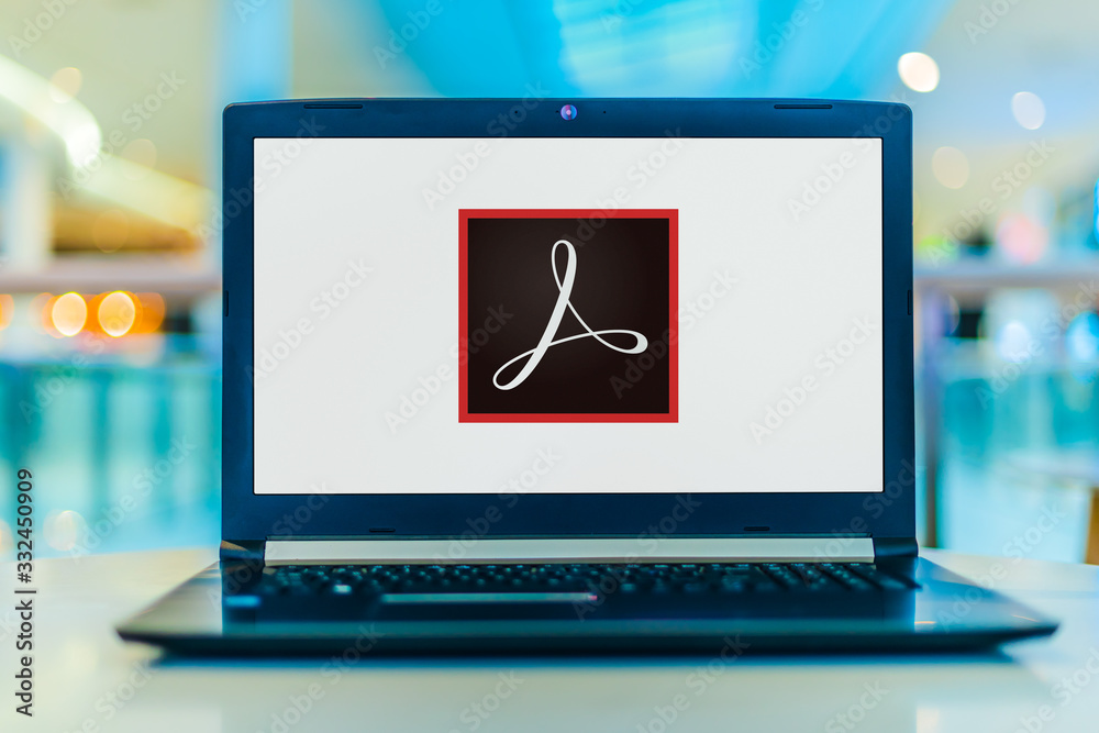 Laptop computer displaying logo of Adobe Acrobat Stock Photo | Adobe Stock