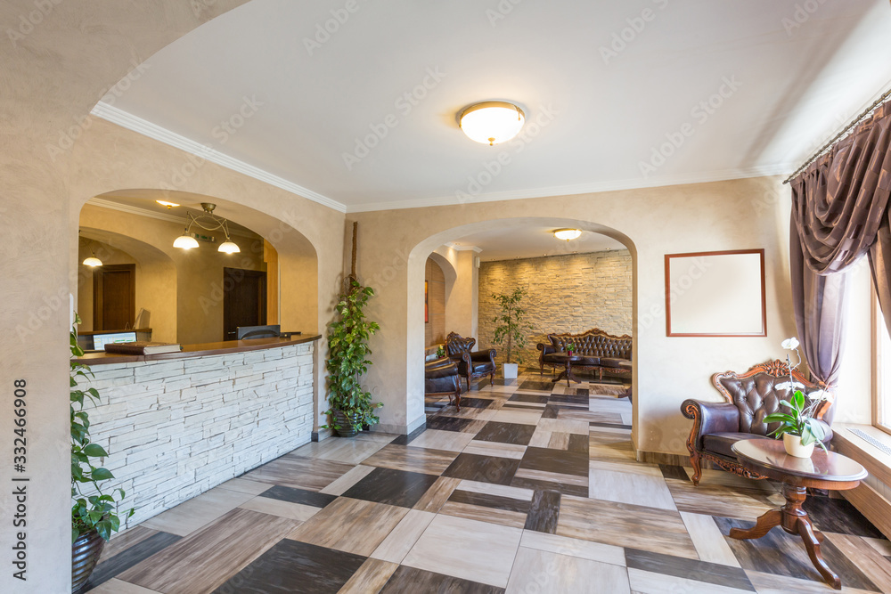 Reception area with reception desk in a small hotel Stock Photo | Adobe ...