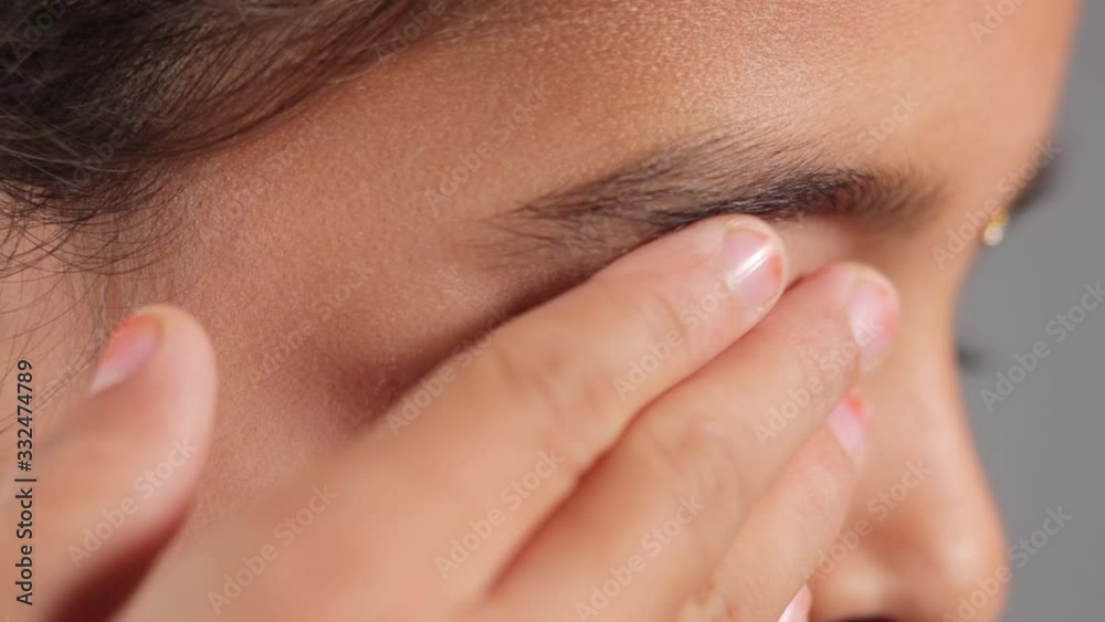 Video Stock Extreme close up of child rubbing her eyes - concept ...