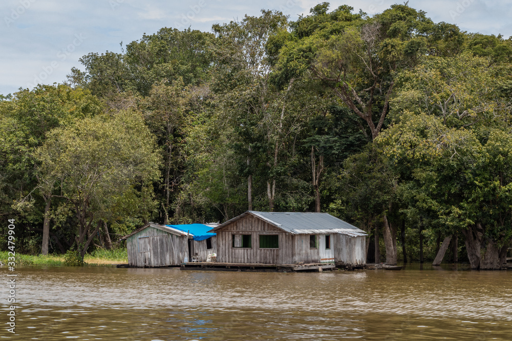 floating house in the amazon river Stock Photo | Adobe Stock