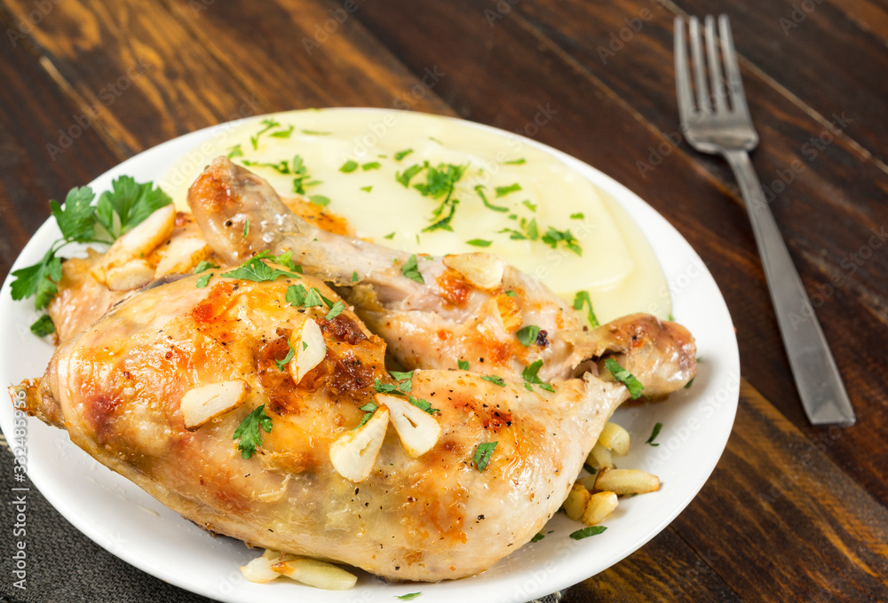 Pollo asado con puré de patata Stock Photo | Adobe Stock