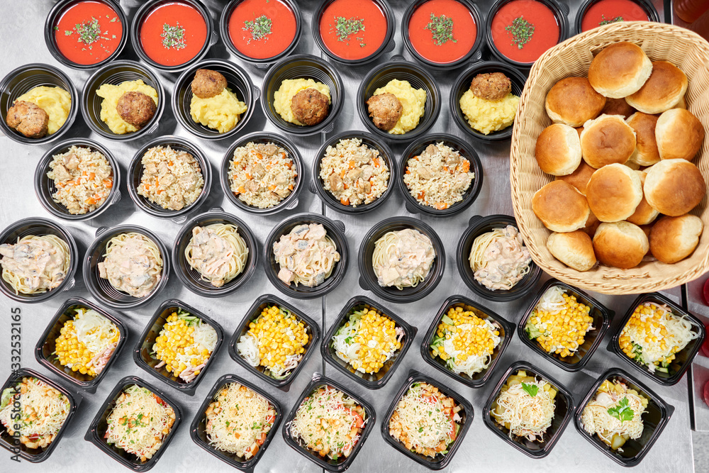 Food delivery. Different in plastic disposable lunch box with healthy ...