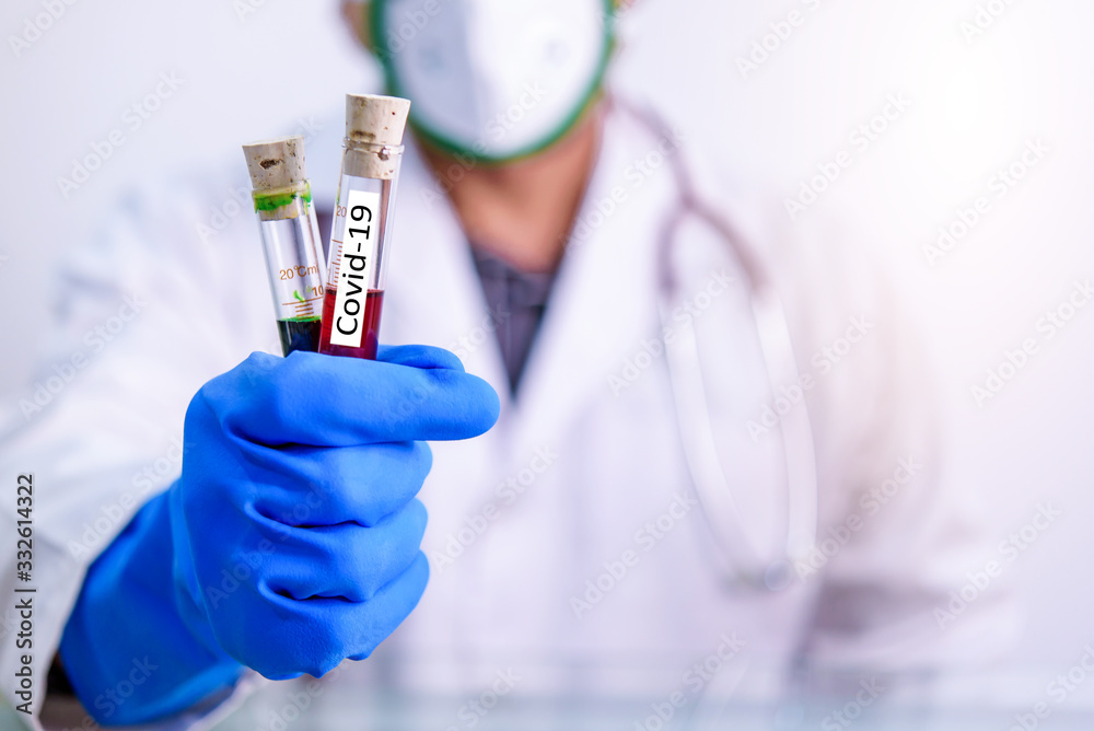 scientist man lab technician assistant or doctor analyzing Covid-19 ...