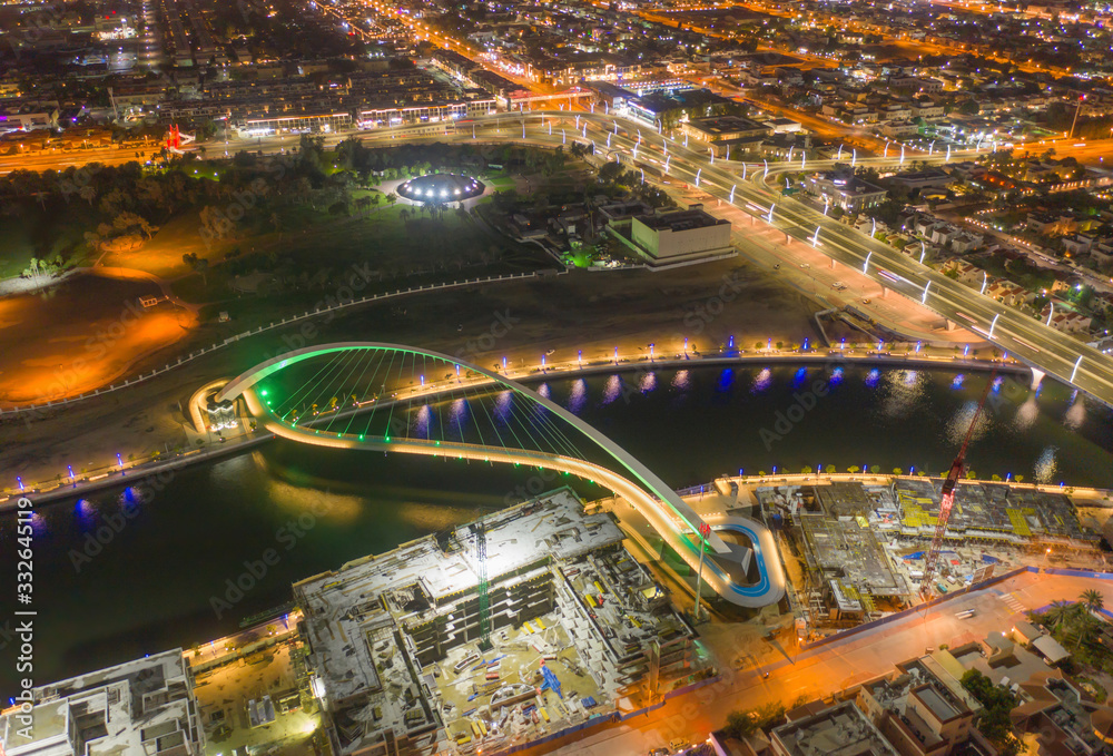 Aerial view of Tolerance bridge and Dubai downtown skyline. Structure ...