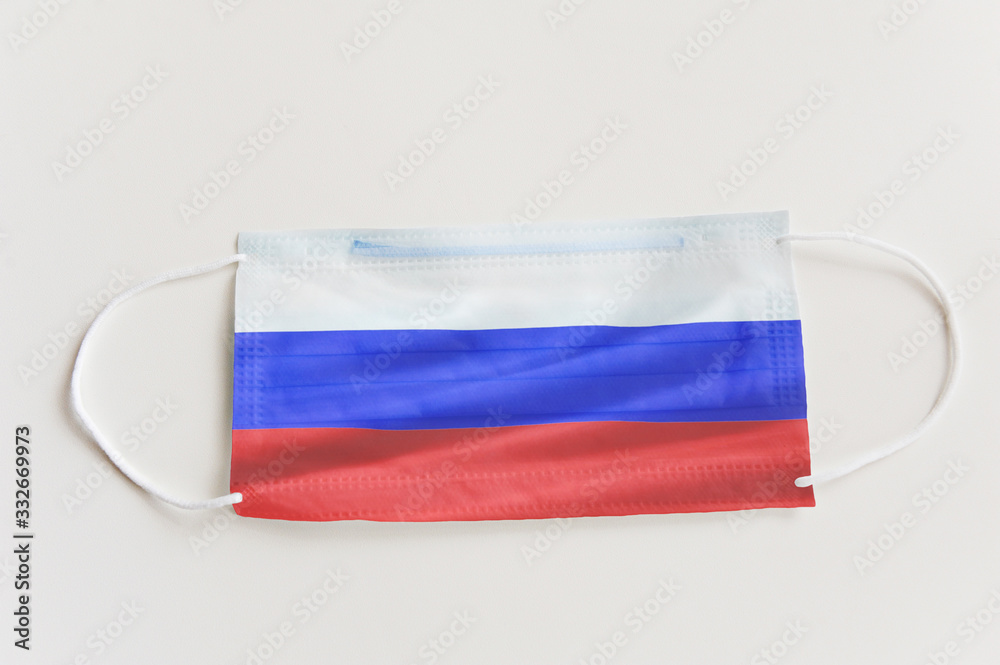 Protective medical mask with the flag of Russia. Symbol of closing ...