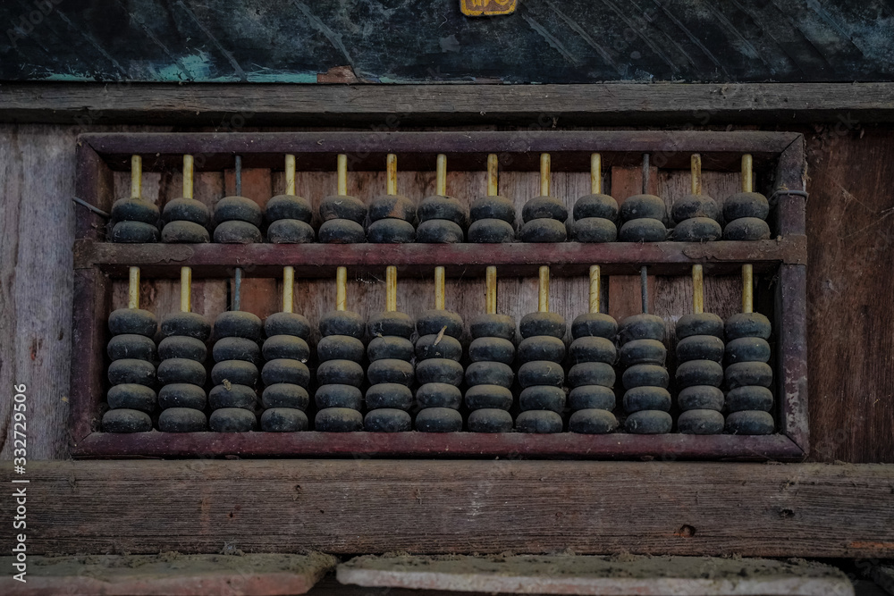 Foto de Vintage Abacuses Ancient Old display in a collection on wooden ...