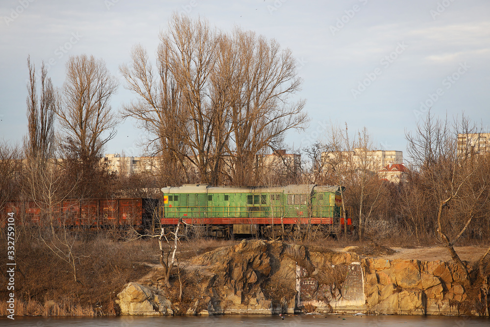Train in a beautiful location with rocks. Rail transport for the ...