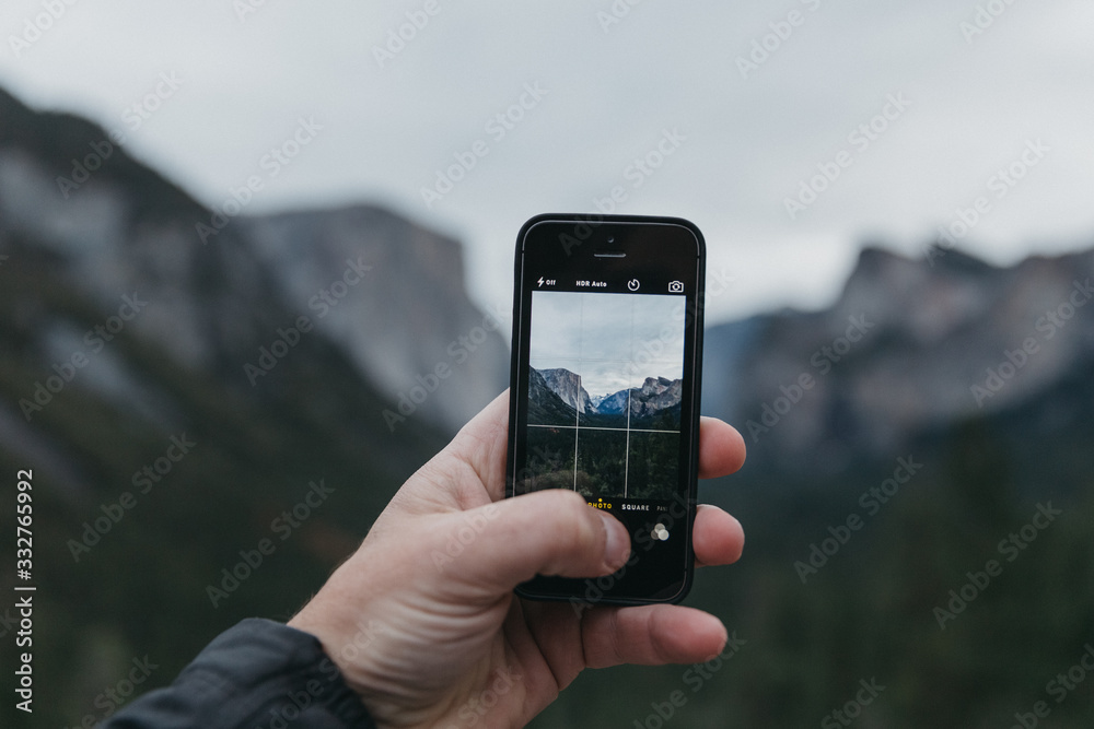mobile phone in hand Stock Photo | Adobe Stock