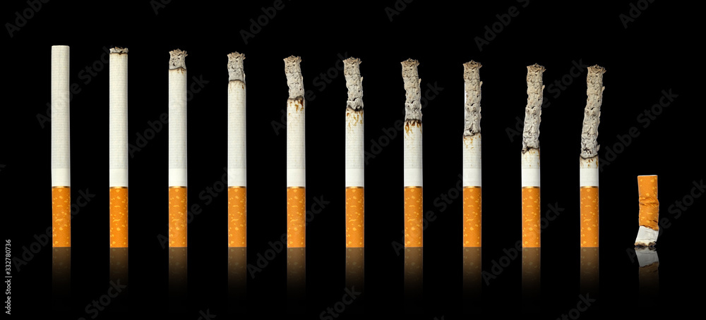 Cigarettes burning and extinguished cigarette black isolated background ...
