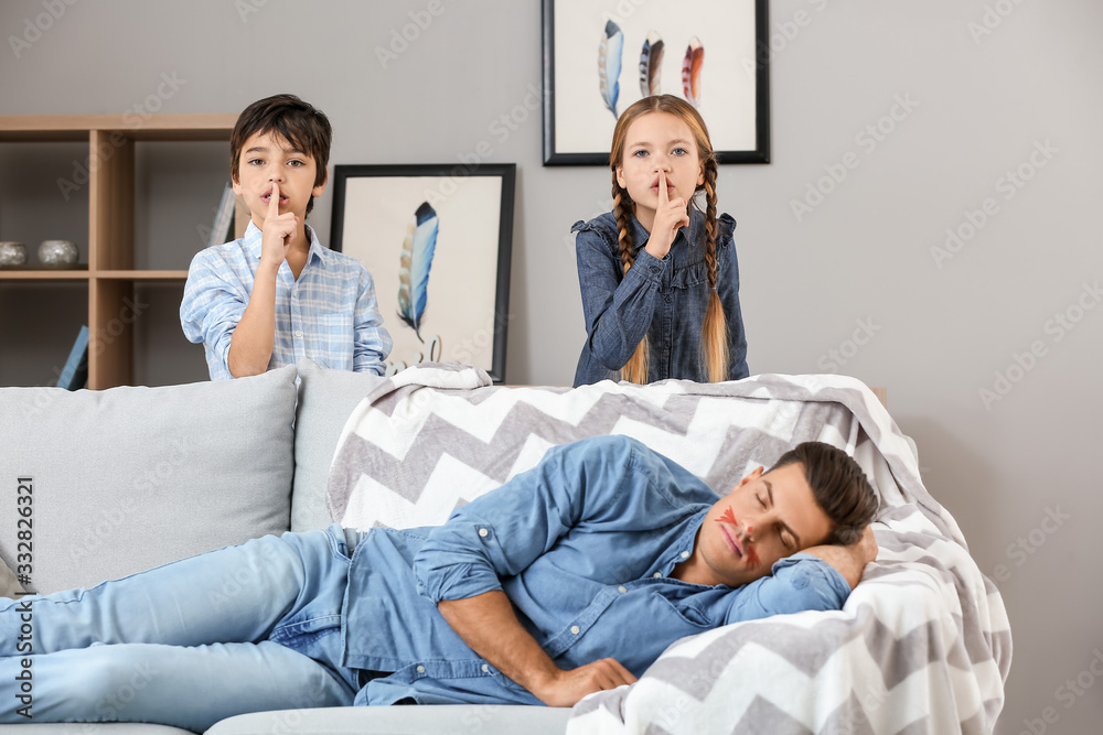 Children playing a prank on their father at home. April Fools' Day ...