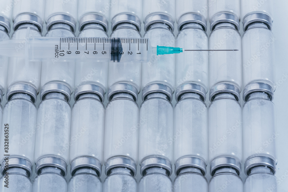 Medicine, Injection, vaccine and disposable syringe, drug concept ...