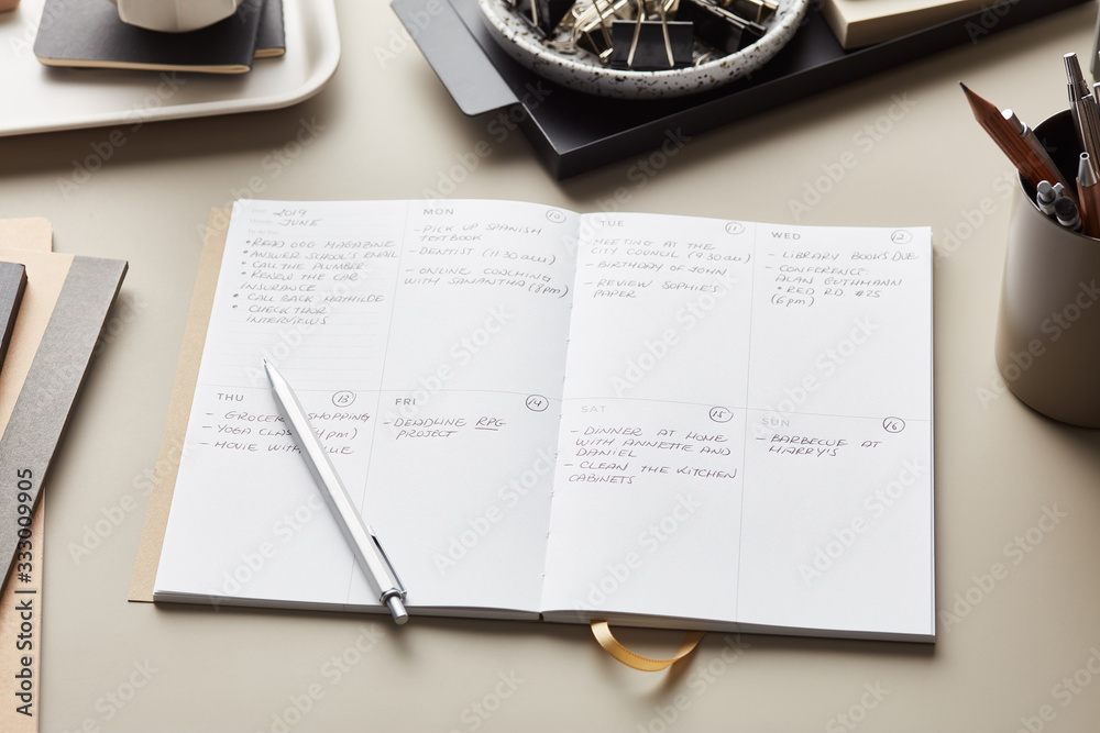 Handwritten notes in weekly planner Stock Photo | Adobe Stock